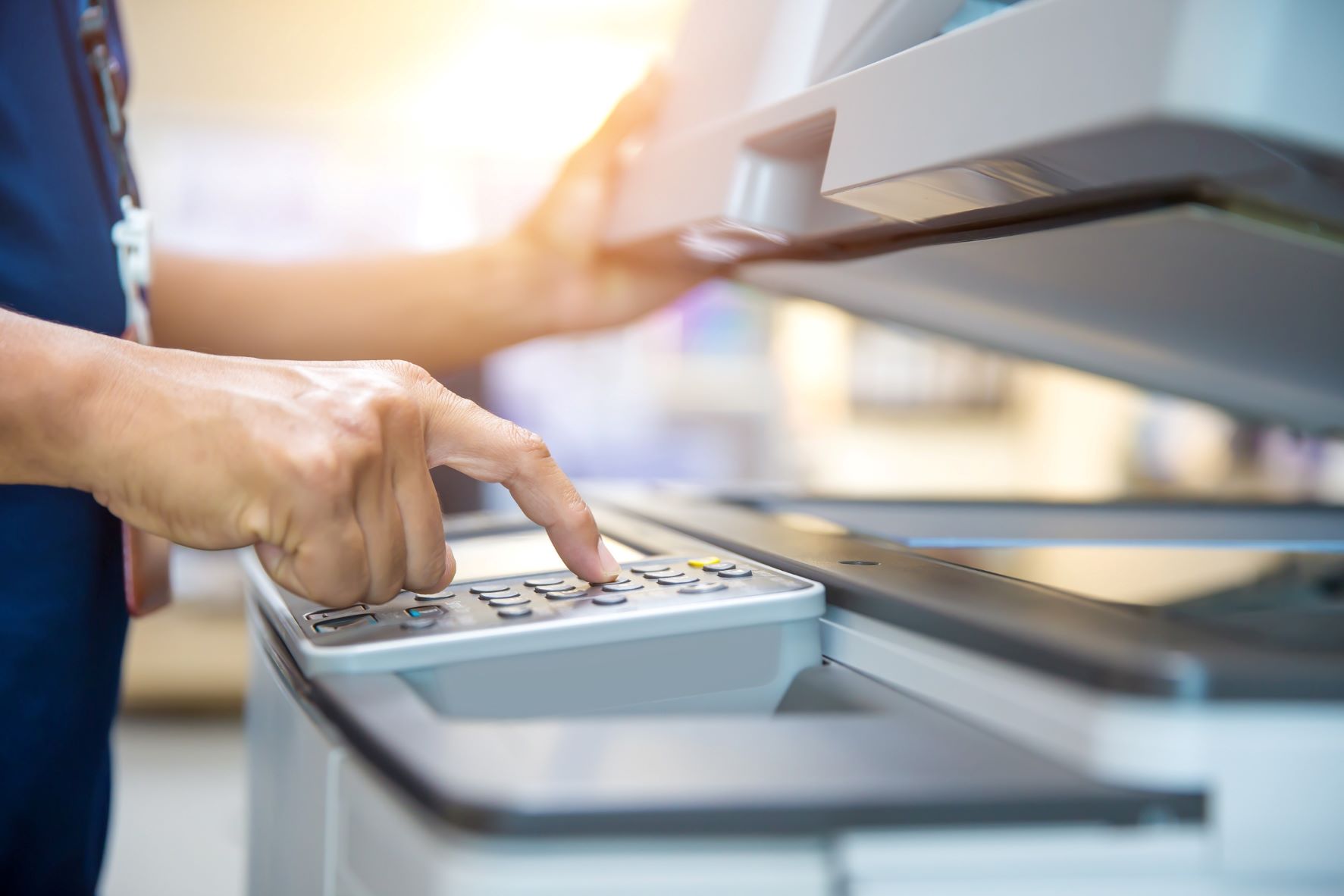 Should You Buy A Business-Class Printer? - Think Ink